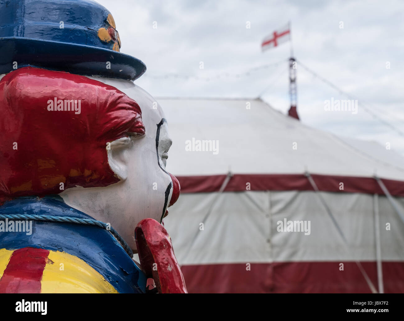 A very large, life-sized circus clown model at the entrance to Ginnets ...