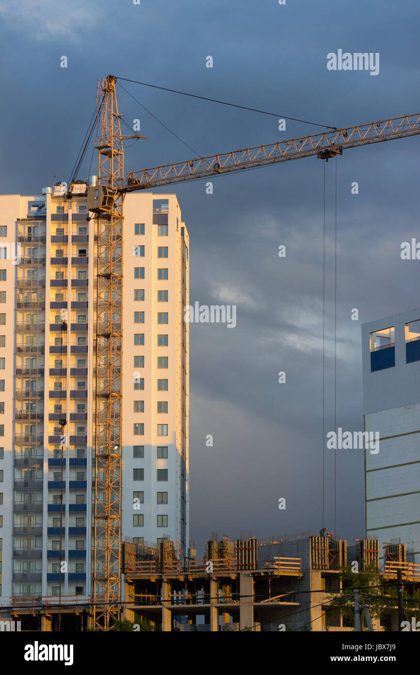 Old High-rise crane used in the construction of a multi-storey building ...