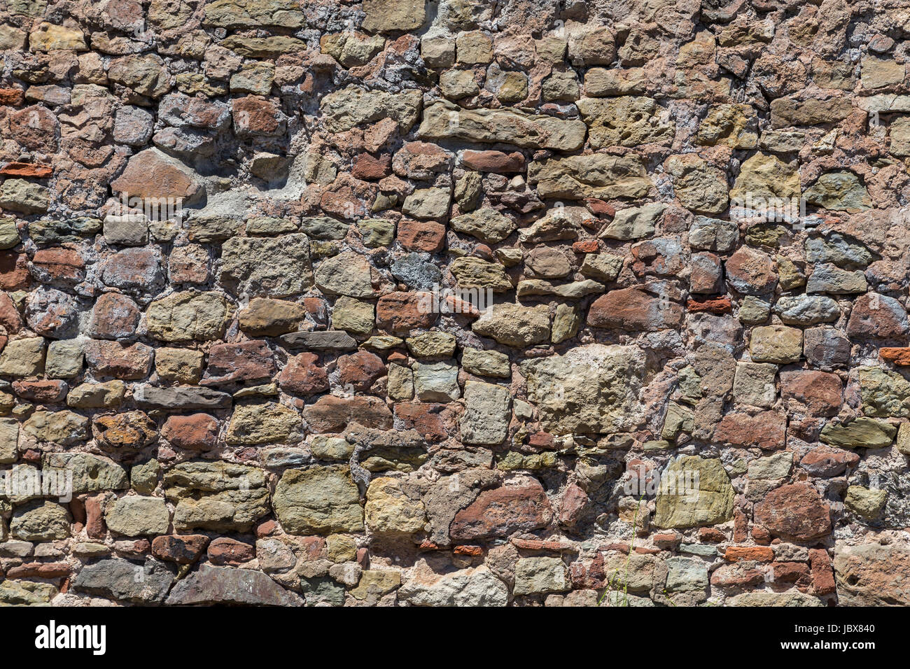 Stone wall made of old stone structure Stock Photo - Alamy