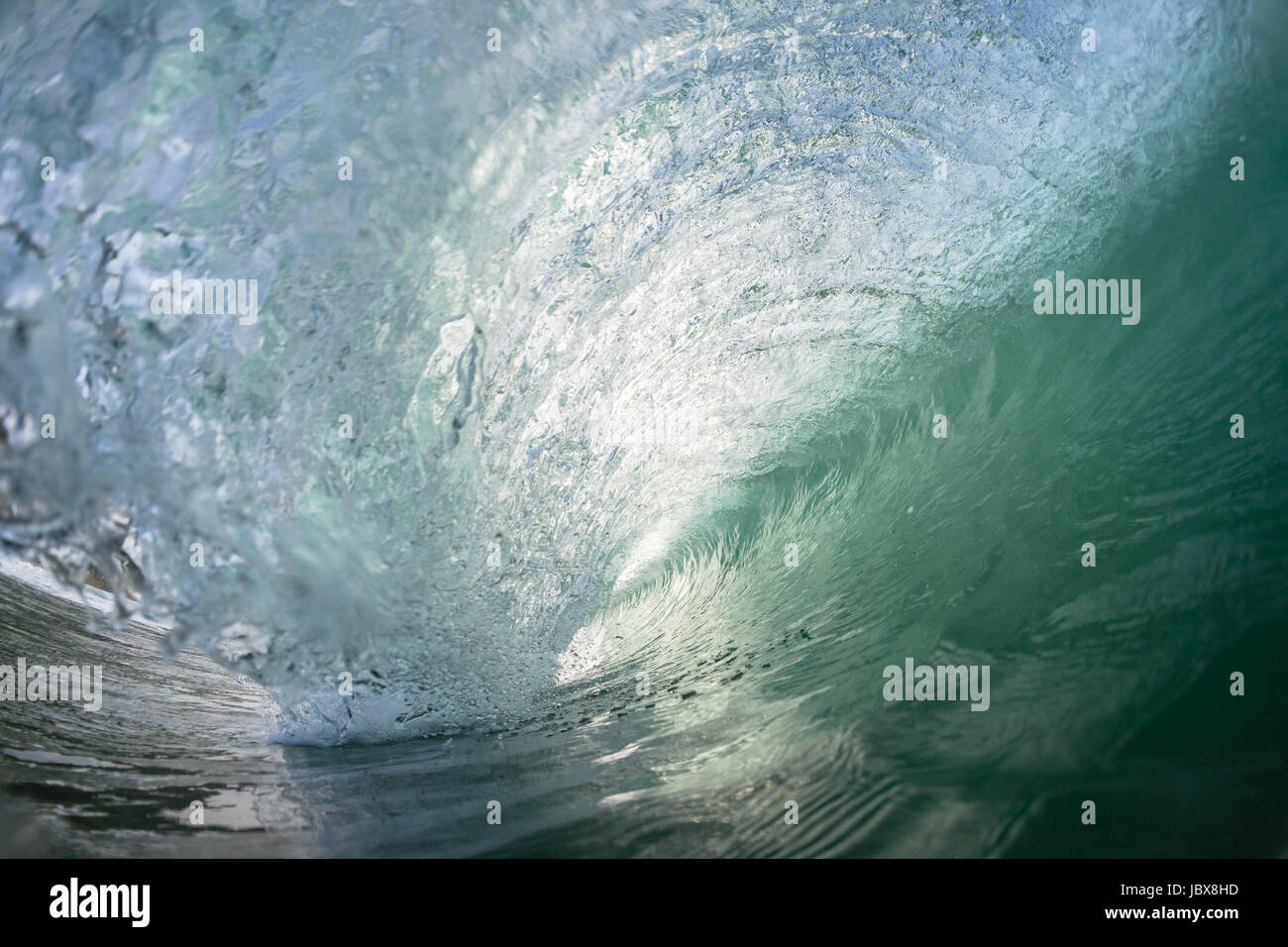Wave closeup hollow crashing water ocean swimming photo Stock Photo - Alamy