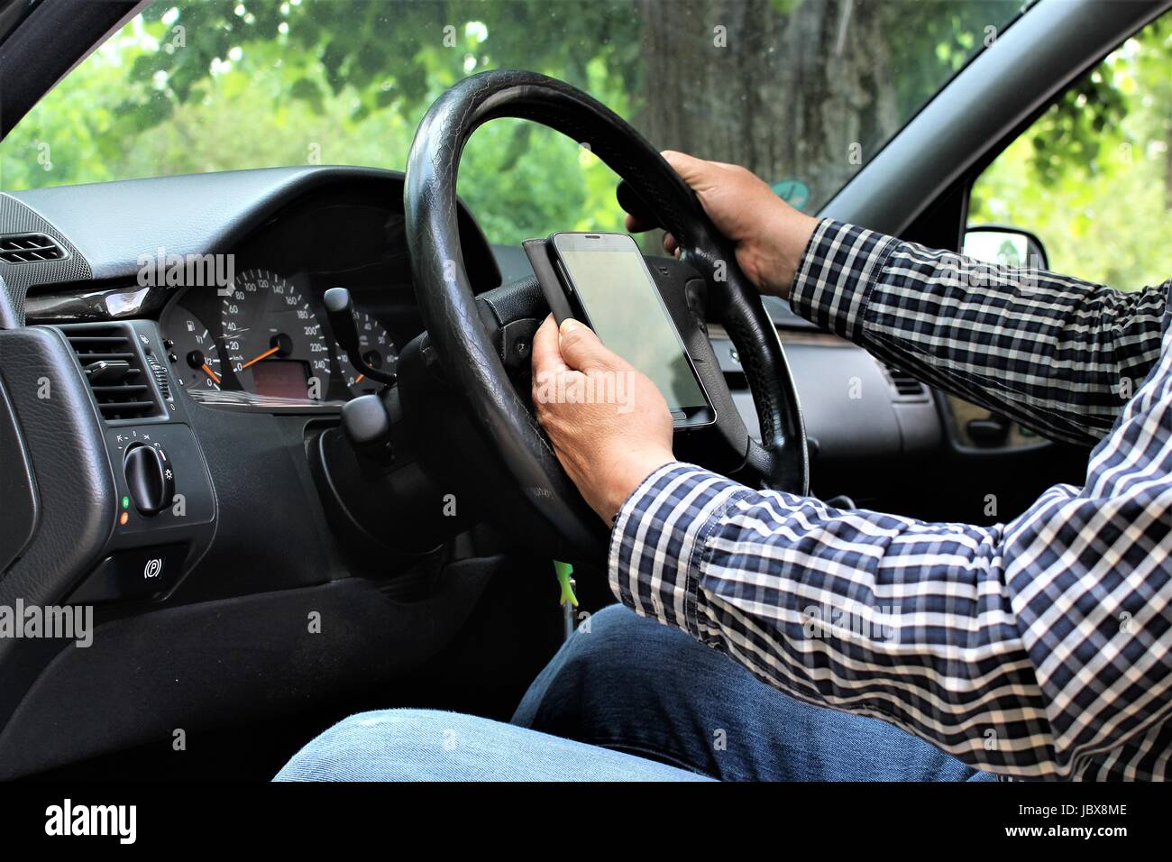 An image of car and mobile phone Stock Photo - Alamy