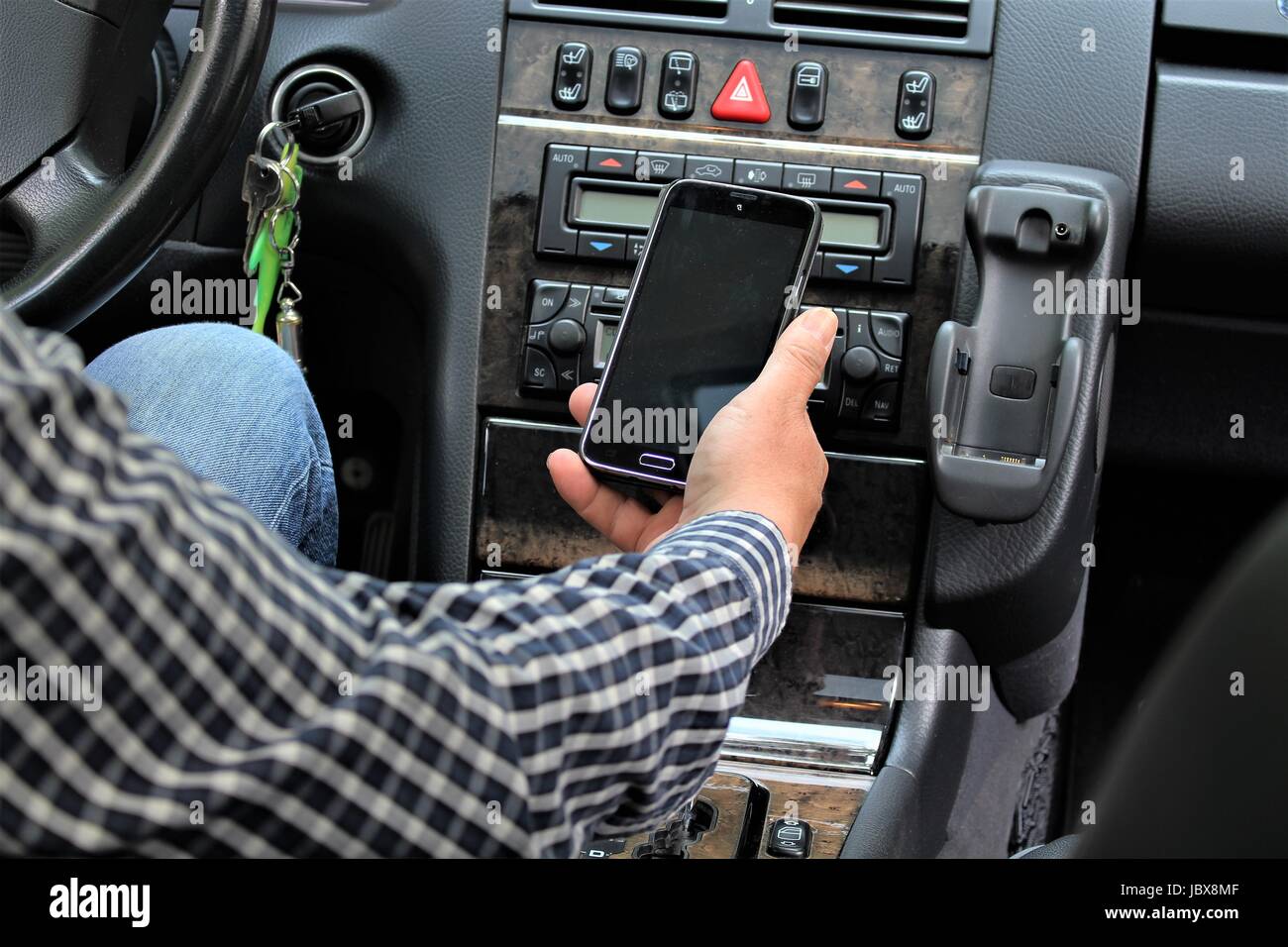 An image of car and mobile phone Stock Photo - Alamy