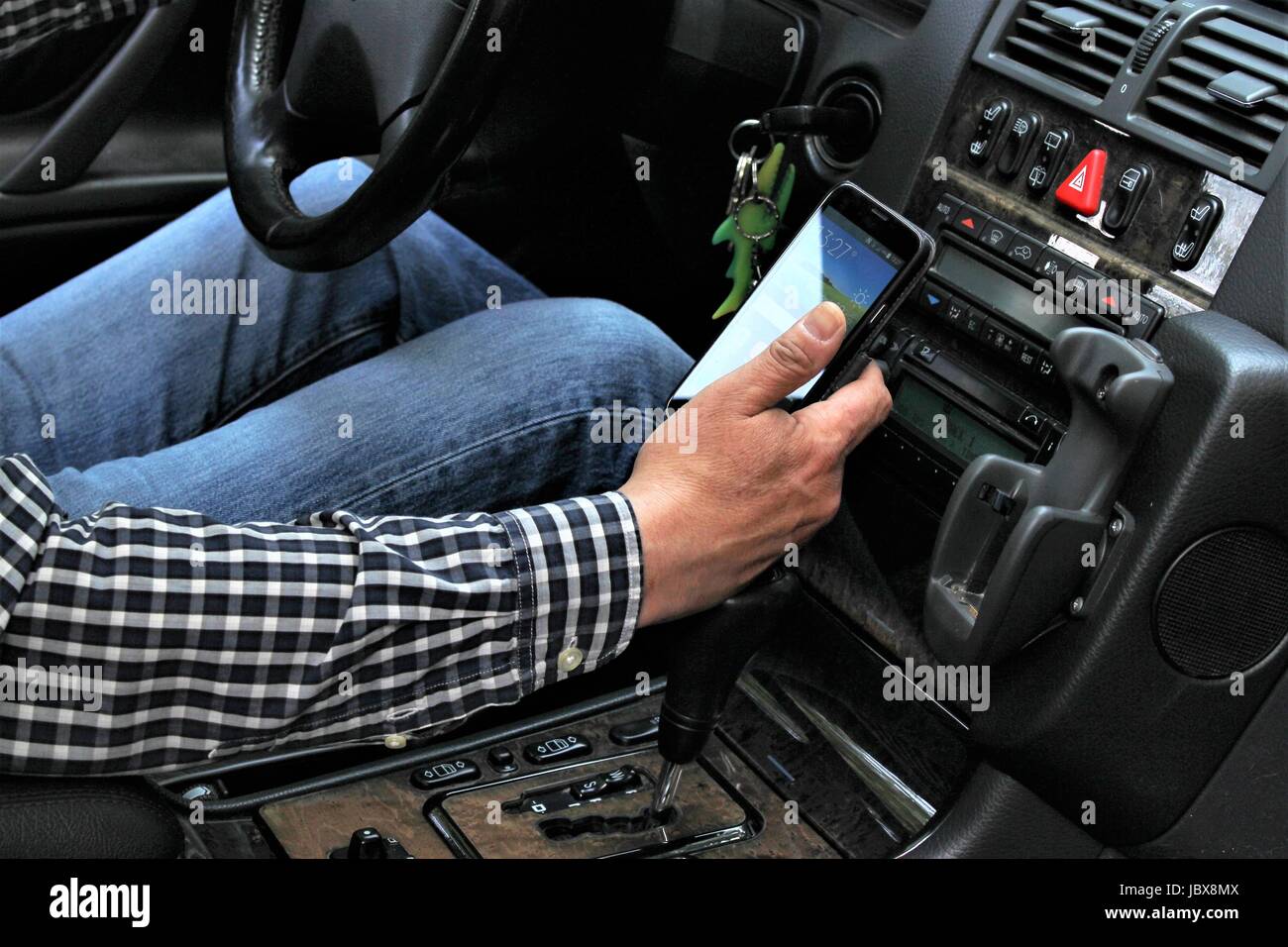 An image of car and mobile phone Stock Photo - Alamy