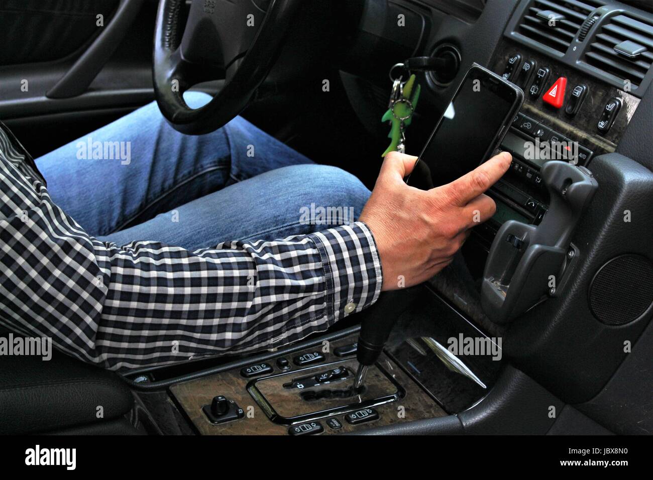 An image of car and mobile phone Stock Photo - Alamy