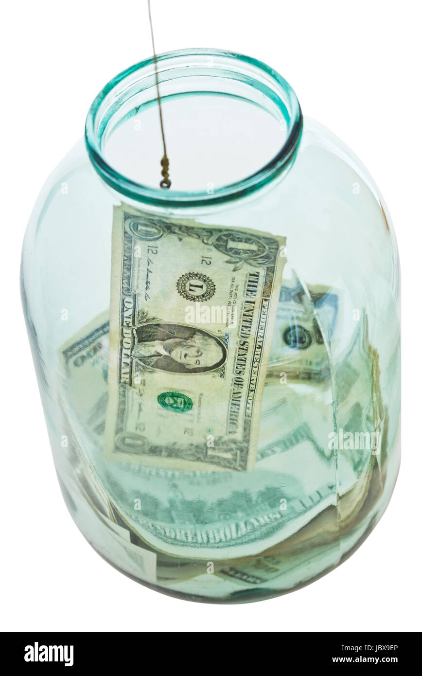 top view of fishing out dollars banknote from glass jar isolated on ...