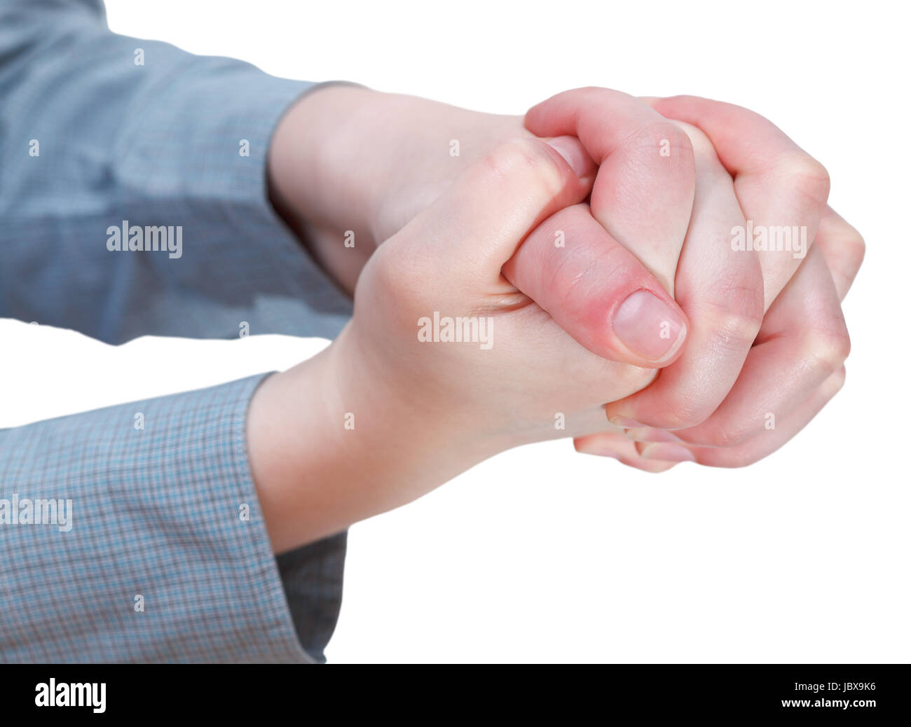 clenched hands close up - hand gesture isolated on white background ...