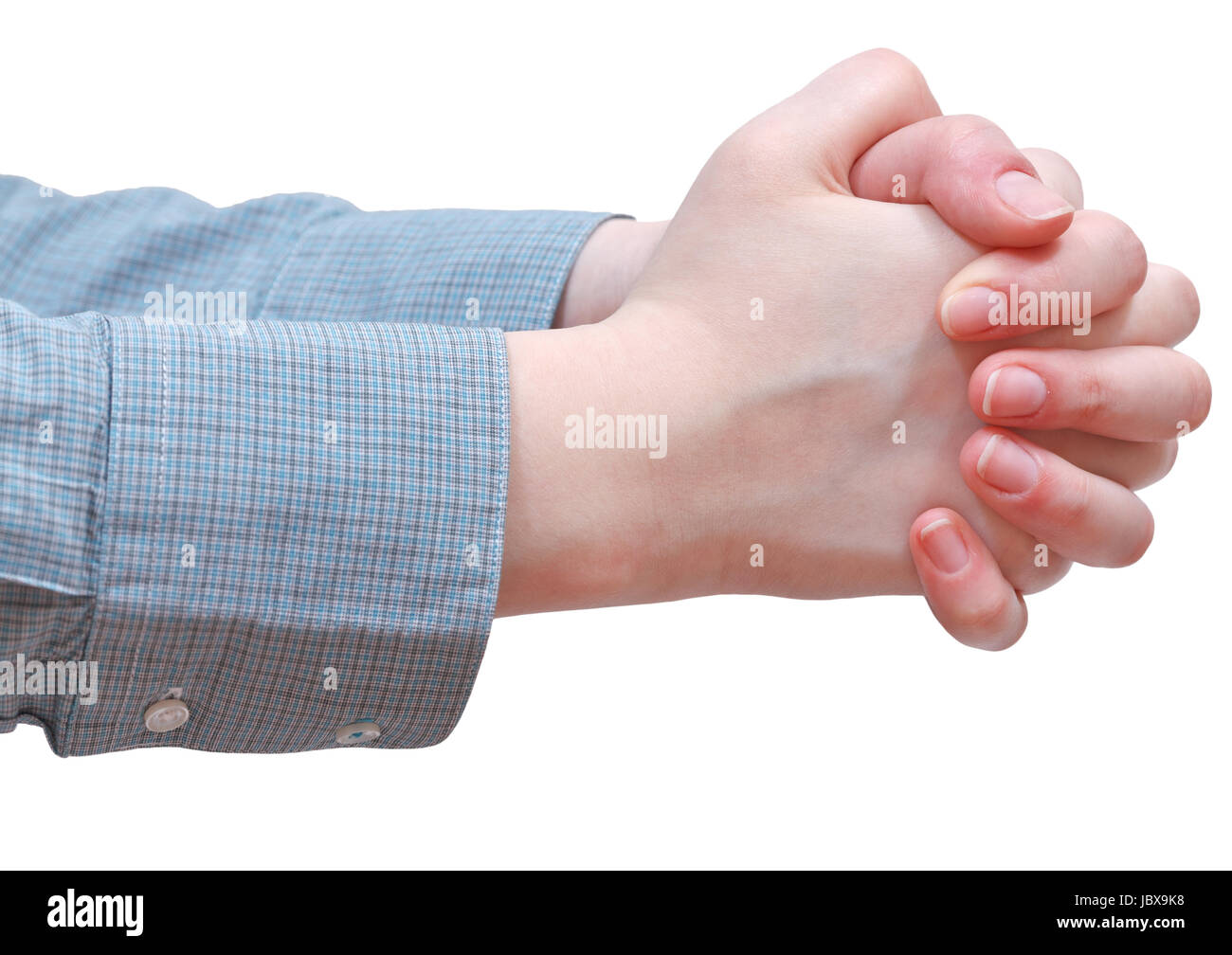 side view of clenched hands - hand gesture isolated on white background ...
