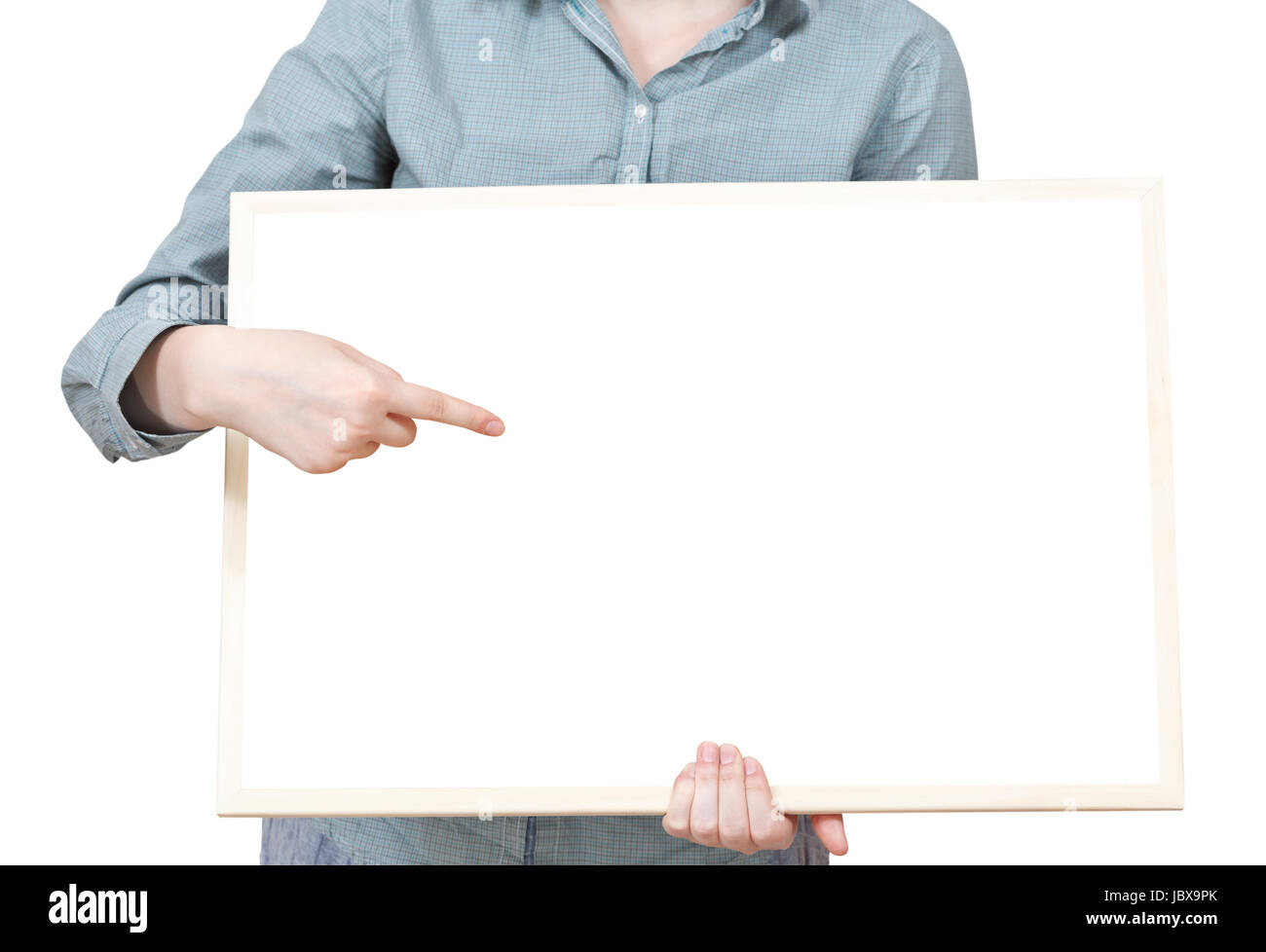 pointing on blank bulletin board in female hand isolated on white ...