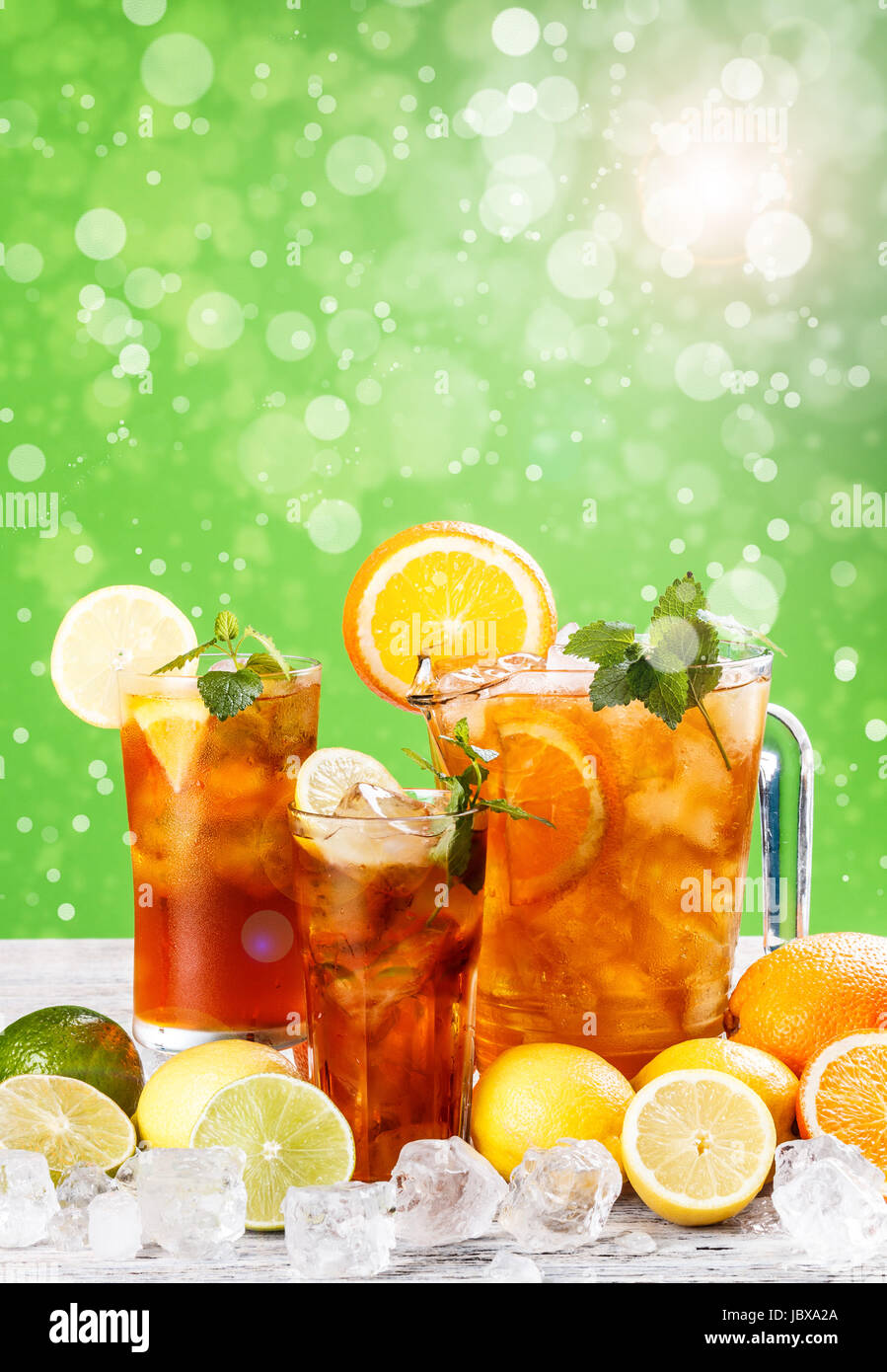 Summer iced tea with lemon, lime and mint Stock Photo - Alamy