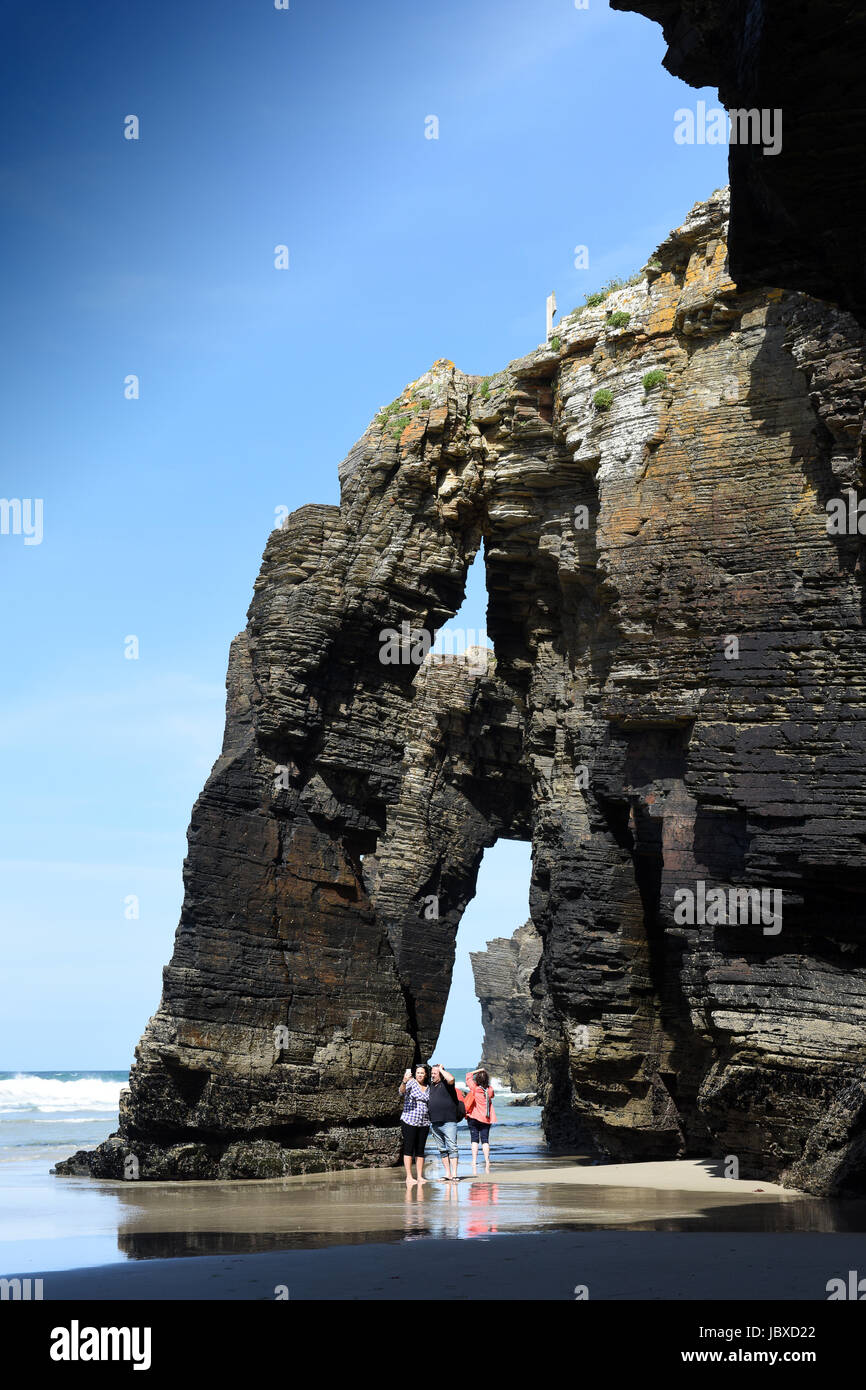 Natural rock arches on Cathedrals beach in Galicia, Northern Spain ...