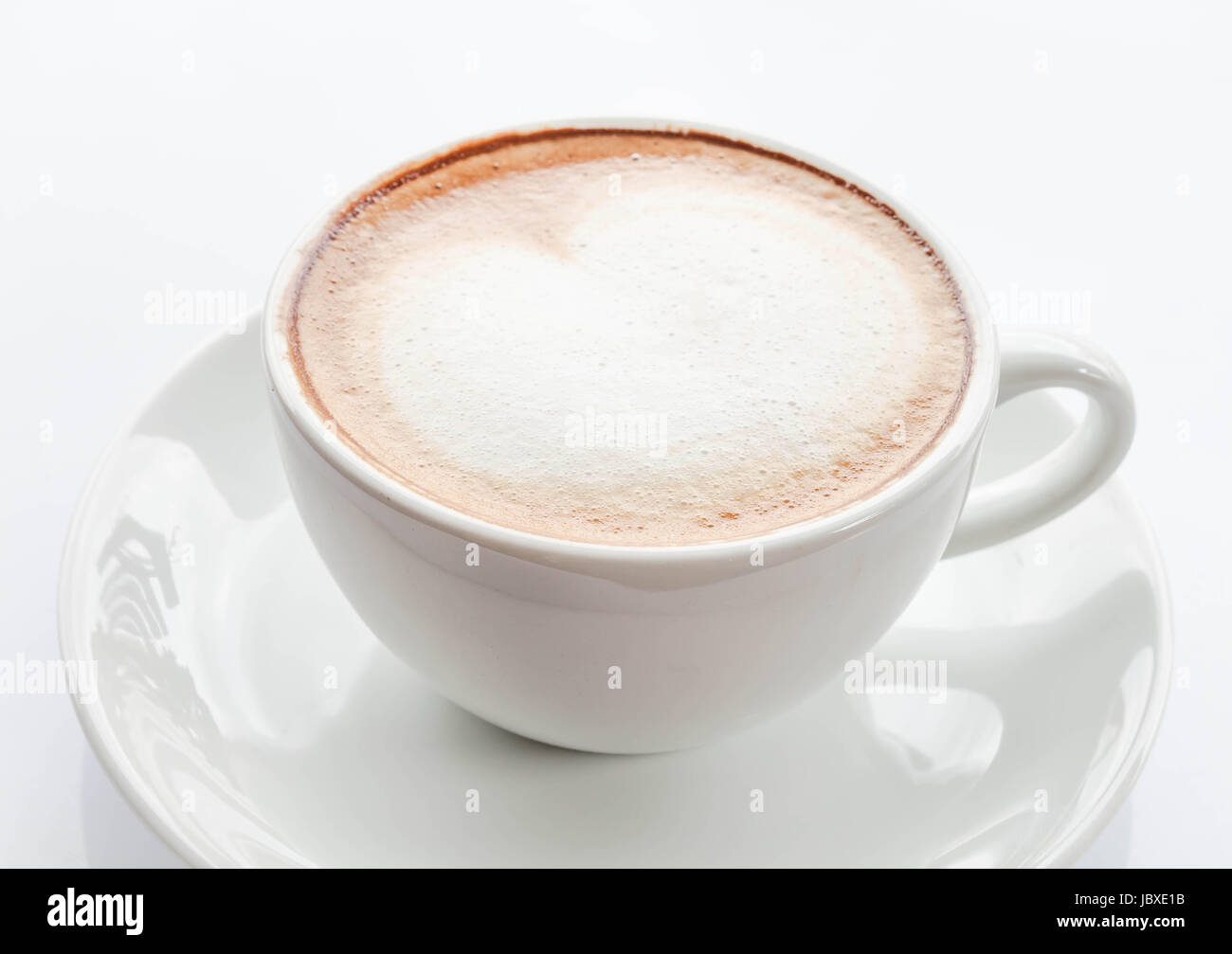 Heart shape of milk microfoam on coffee latte Stock Photo - Alamy