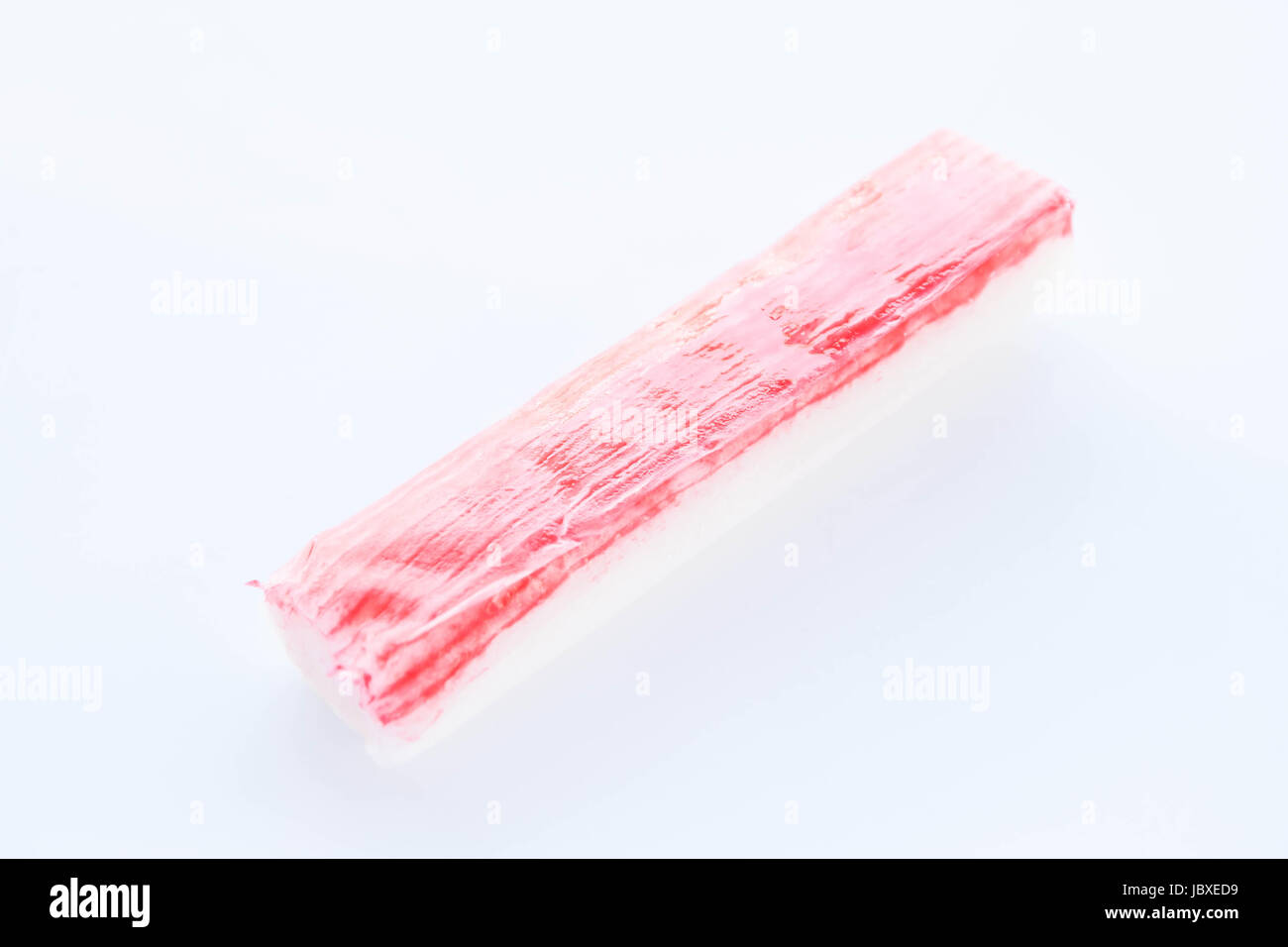 Piece of crab stick isolated on white background, stock photo Stock ...