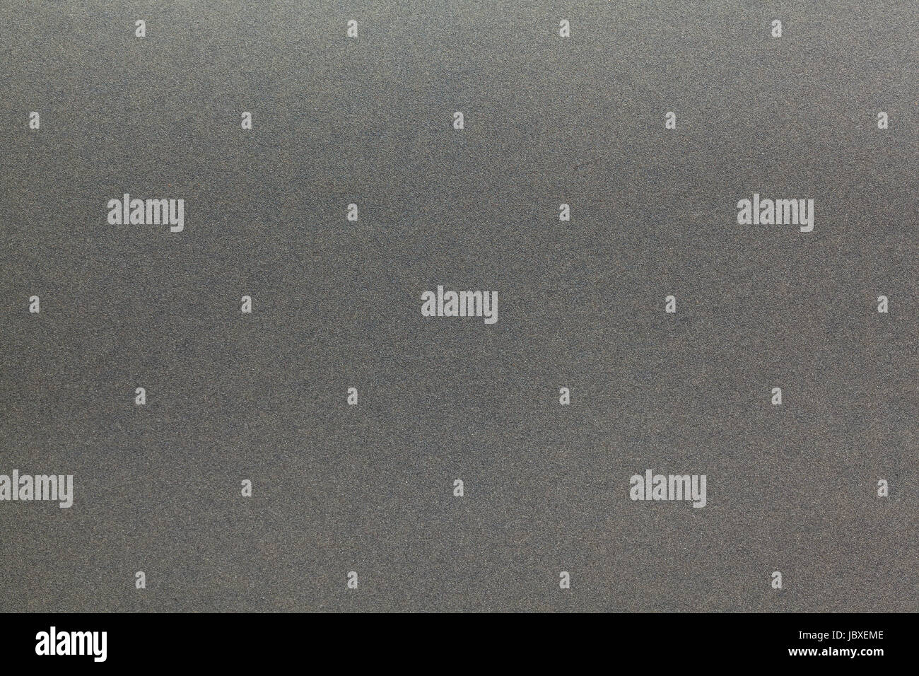 sheet of black sand paper for background Stock Photo - Alamy
