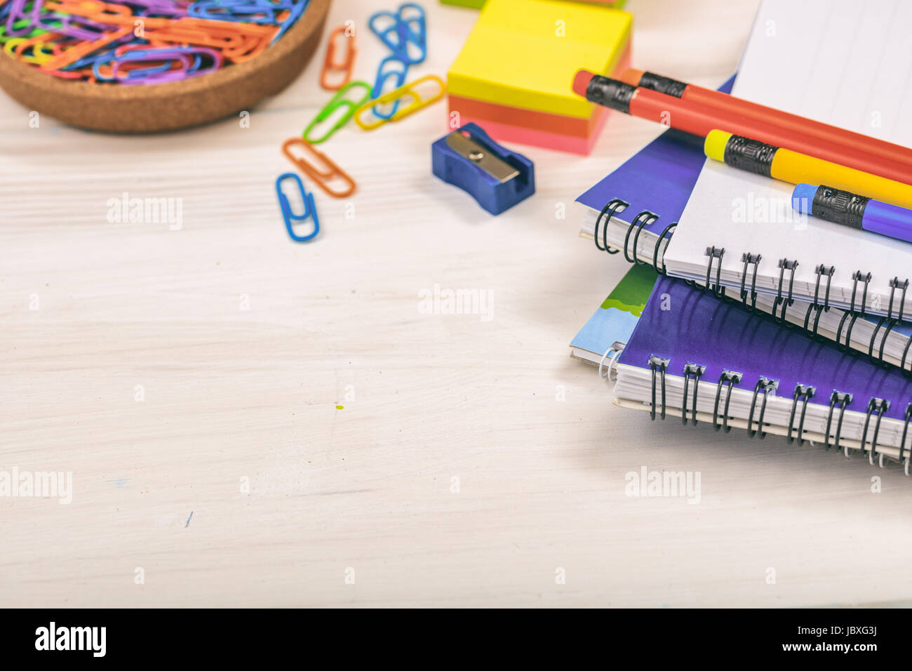 Variety of school - office supplies on wooden background Stock Photo ...