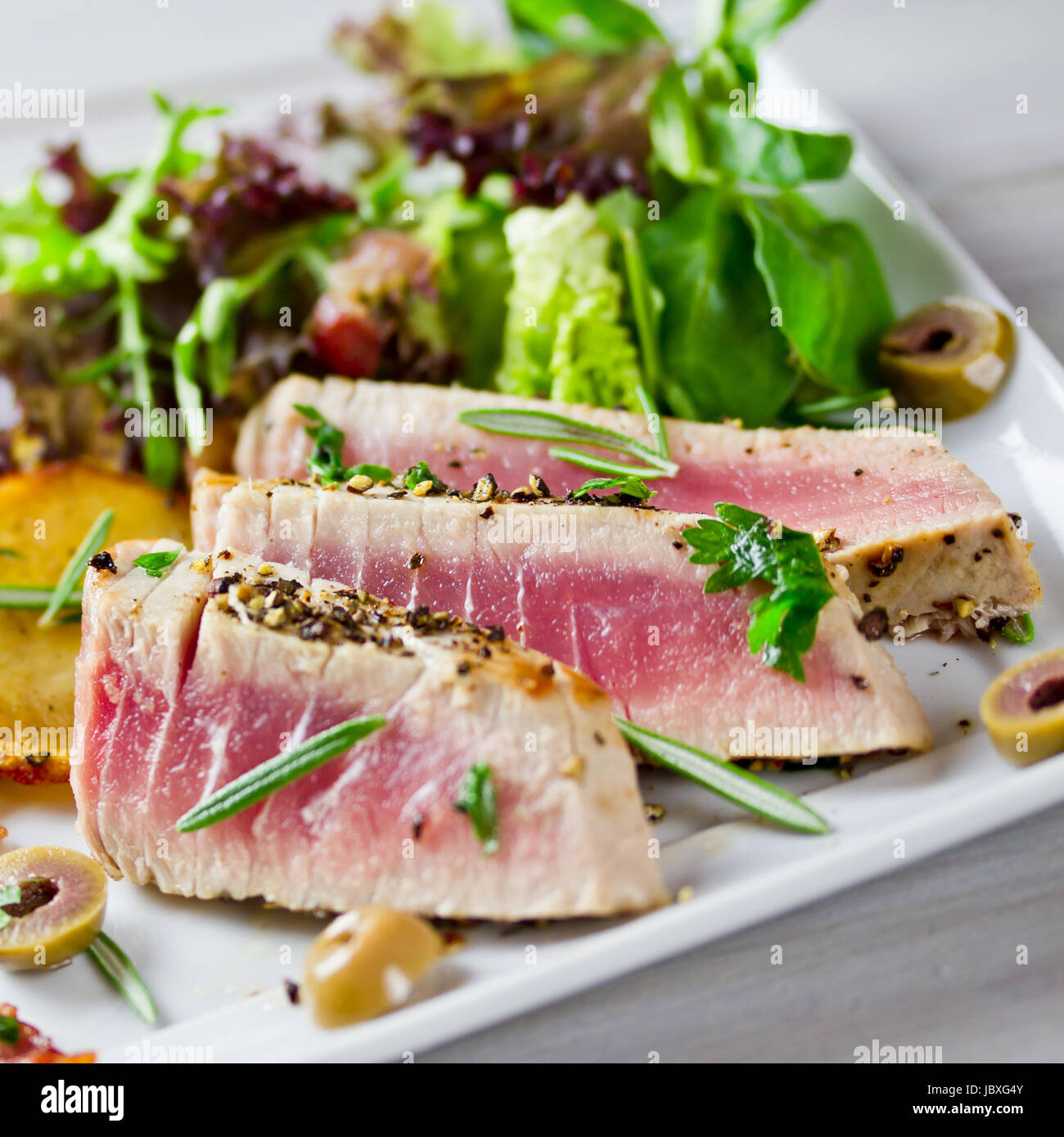 Tuna steak fried potatoes hi-res stock photography and images - Alamy