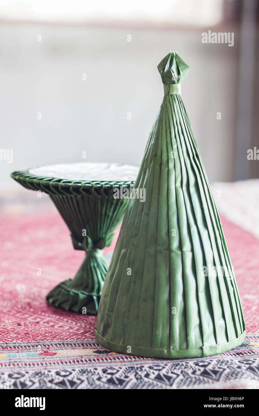 Handmade rituals cone from artificial banana leaf Stock Photo - Alamy