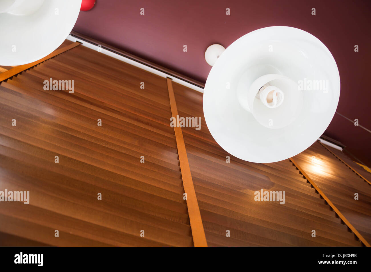 Modern ceiling lights on a wall Stock Photo - Alamy