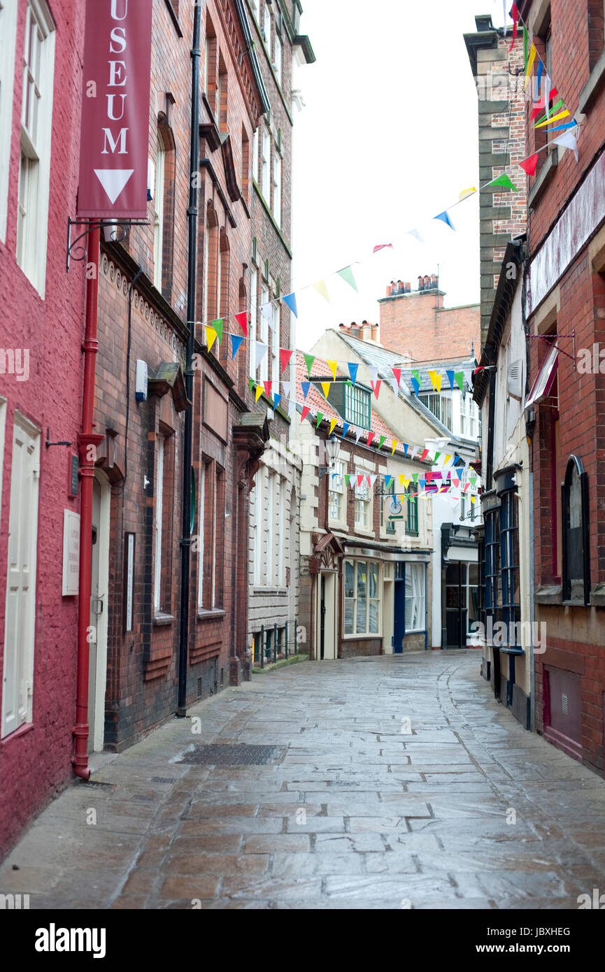 View down quaint cobbled Grape Lane in Whitby, North Yorkshire with ...