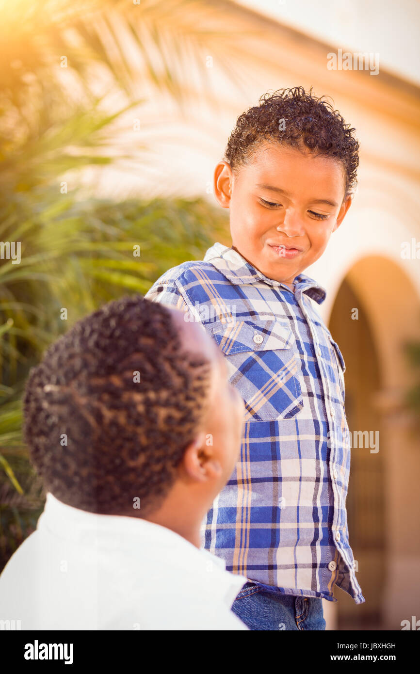 Mixed Race Son And African American Father Playing Outdoors Together