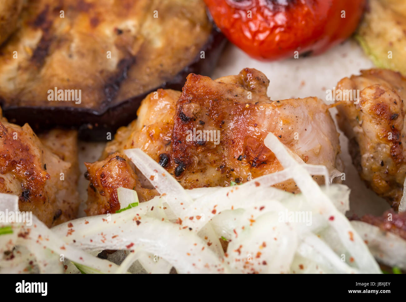 Mixed grilled meats platter with vegetables. Macro. Photo can be used ...