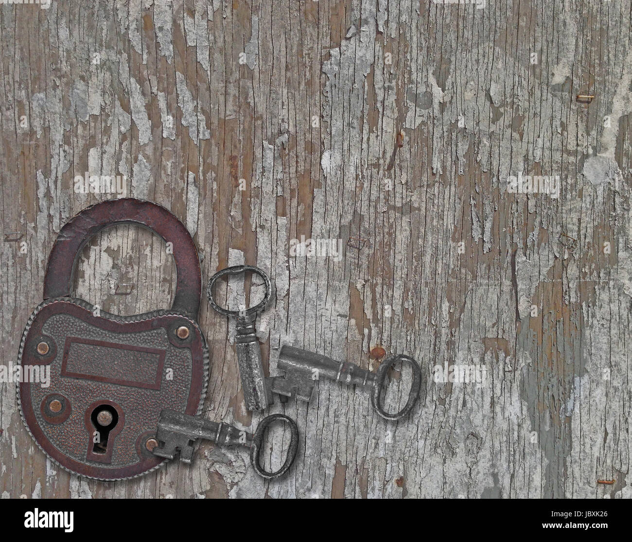 copper padlock and a keys on a weathered old wooden panel Stock Photo ...