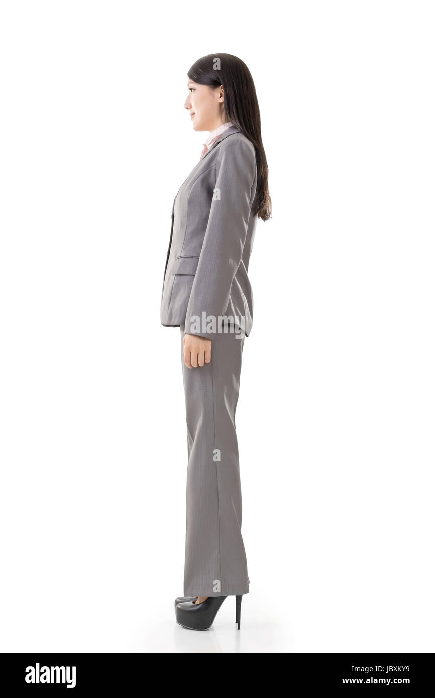 Full length portrait of Asian business woman wear pant suit, side view ...