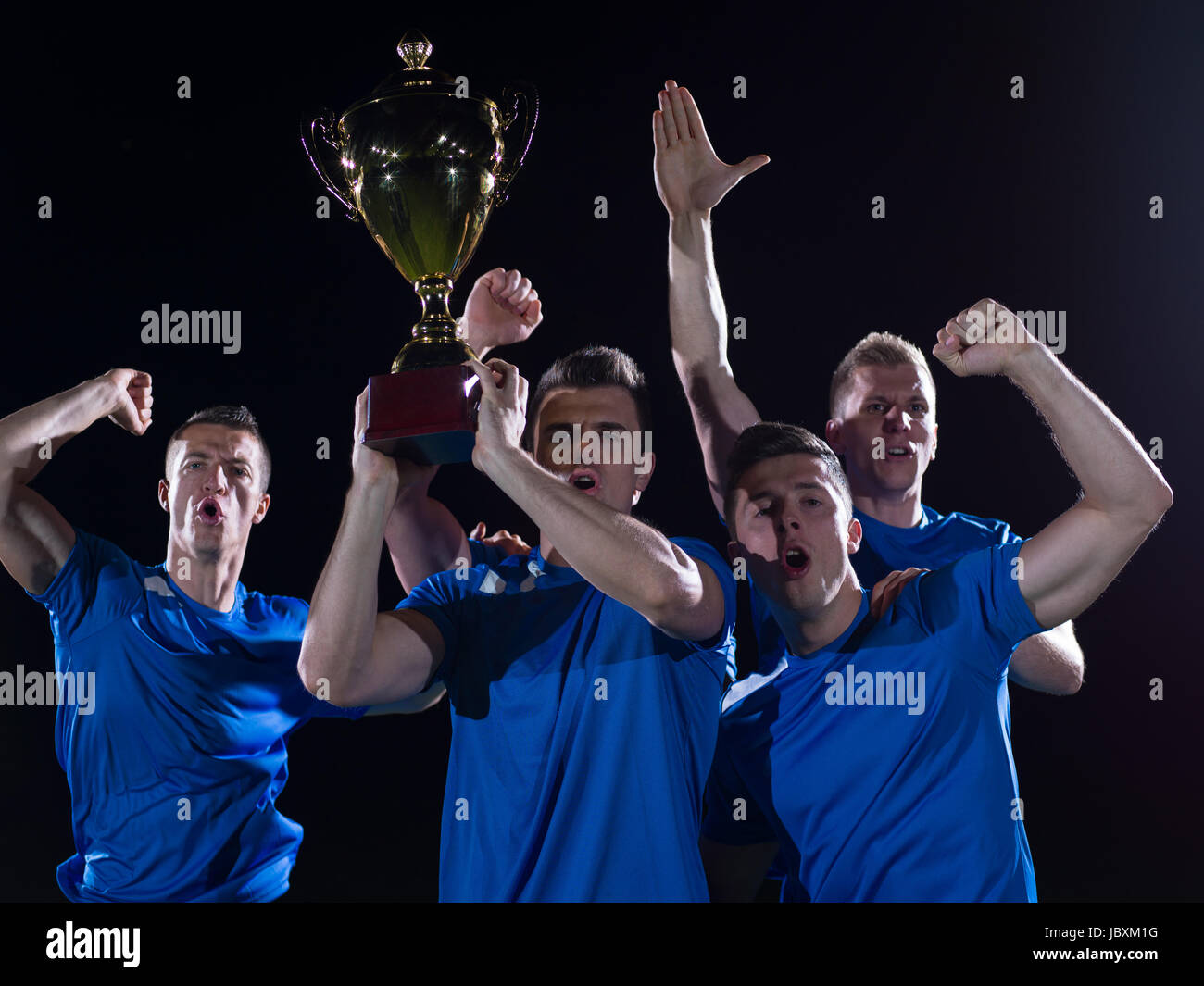 soccer players team group celebrating the victory and become champion ...