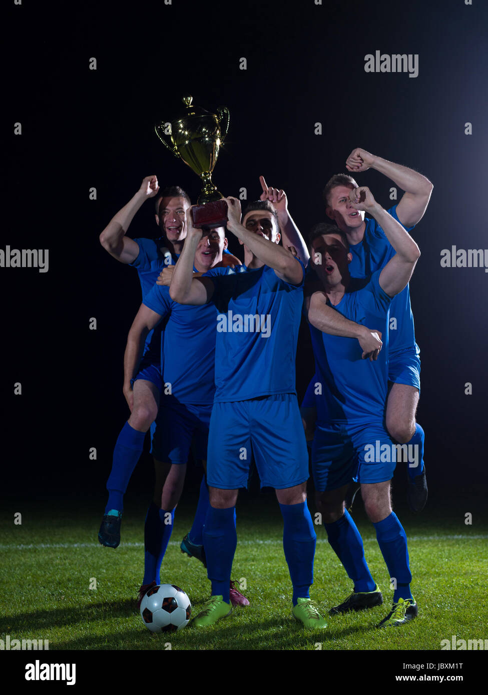 soccer players team group celebrating the victory and become champion ...
