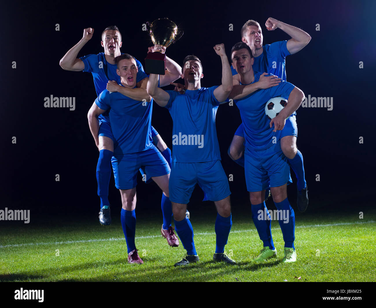 soccer players team group celebrating the victory and become champion ...