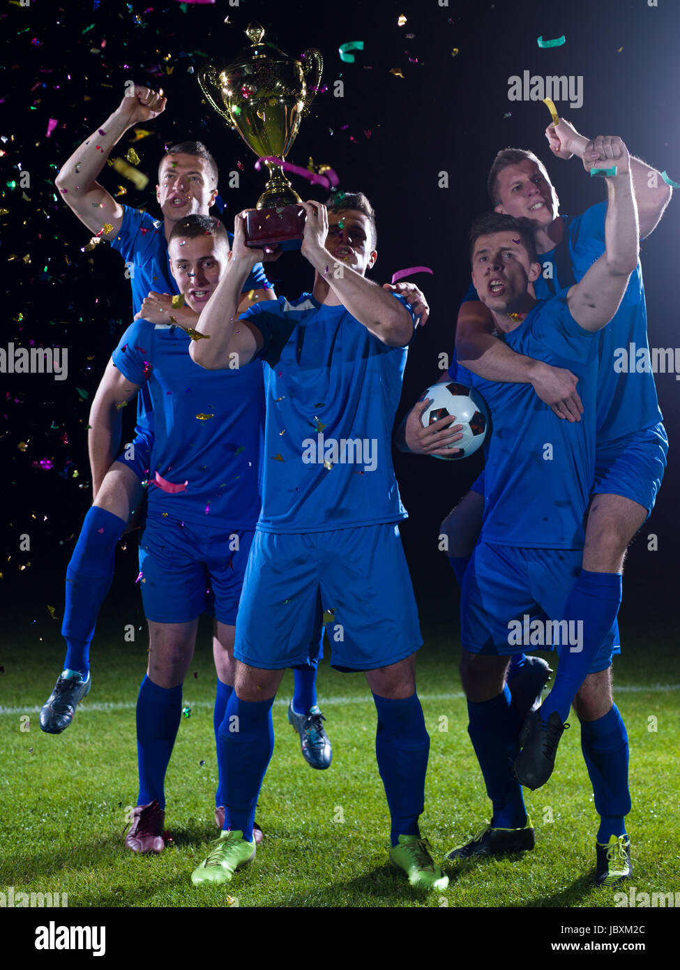 soccer players team group celebrating the victory and become champion ...