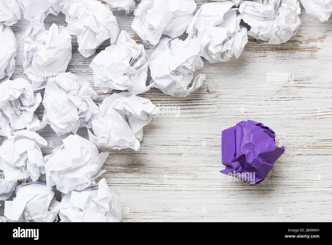 Set of crumpled paper balls with one colorful Stock Photo - Alamy