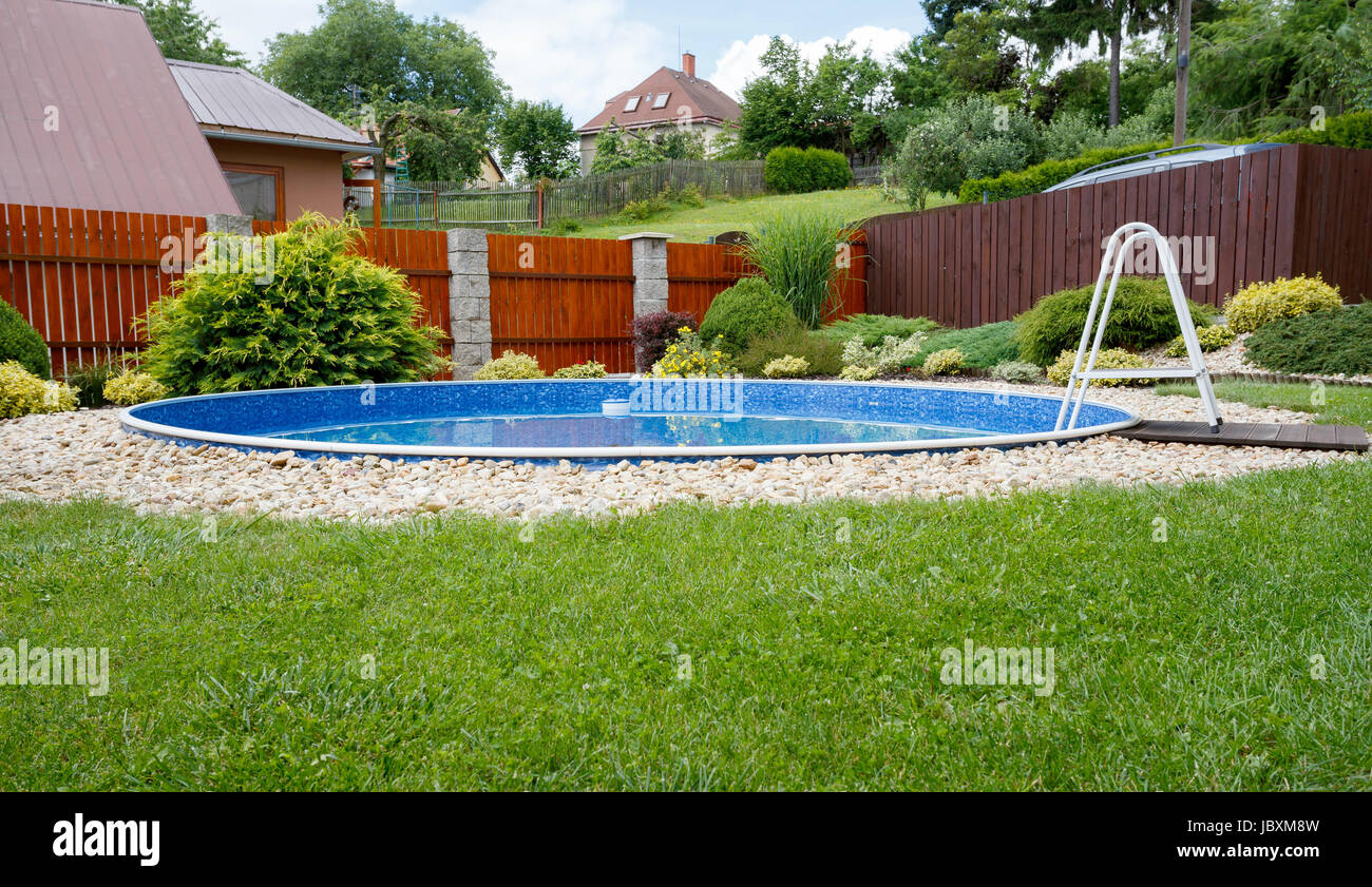 small home swimming pool in rural garden in sunny day Stock Photo - Alamy