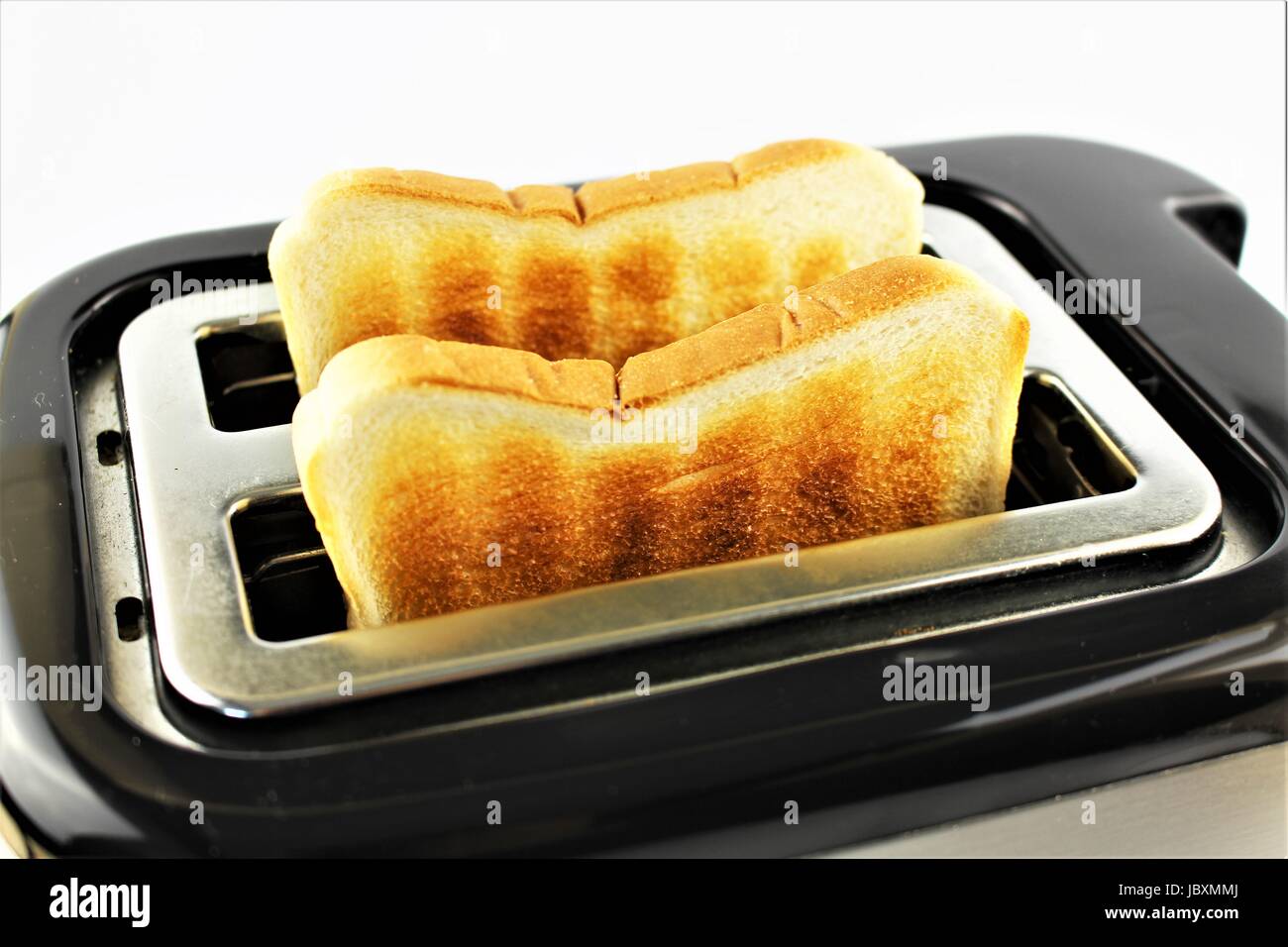 An Image of a toast and a toaster Stock Photo - Alamy