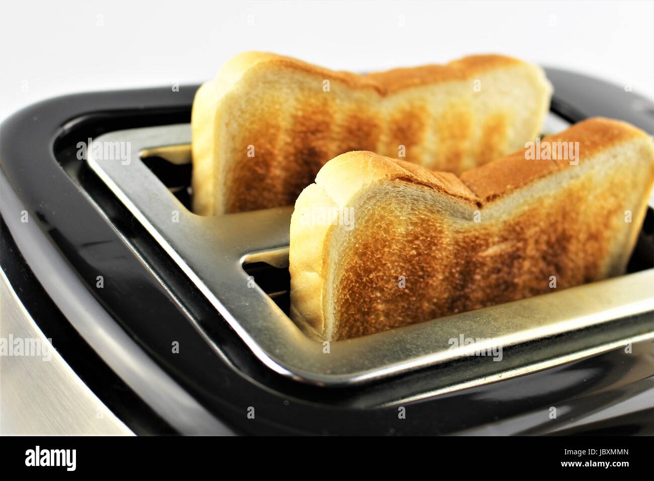 An Image of a toast and a toaster Stock Photo - Alamy