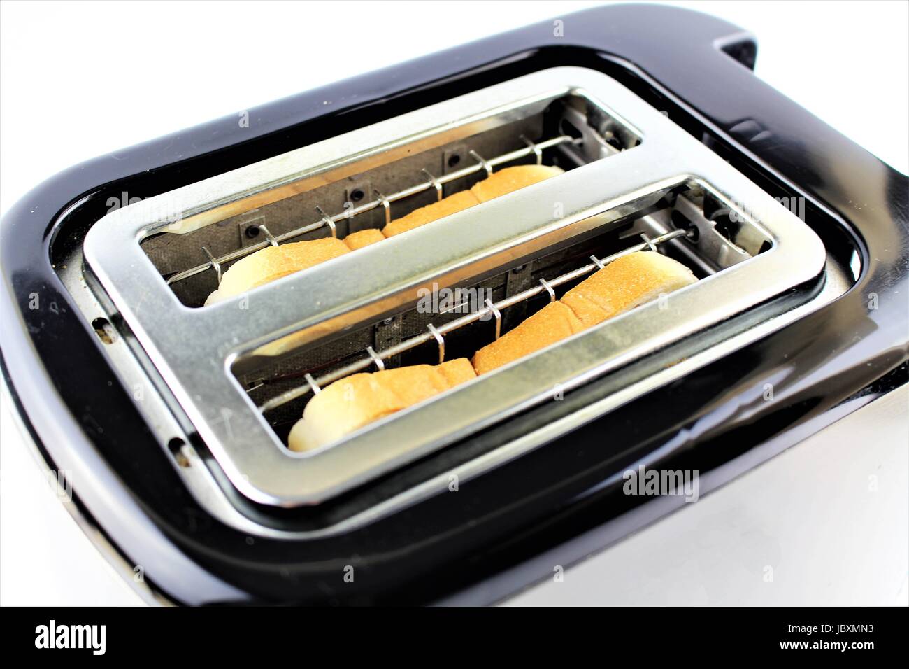 An Image of a toast and a toaster Stock Photo - Alamy
