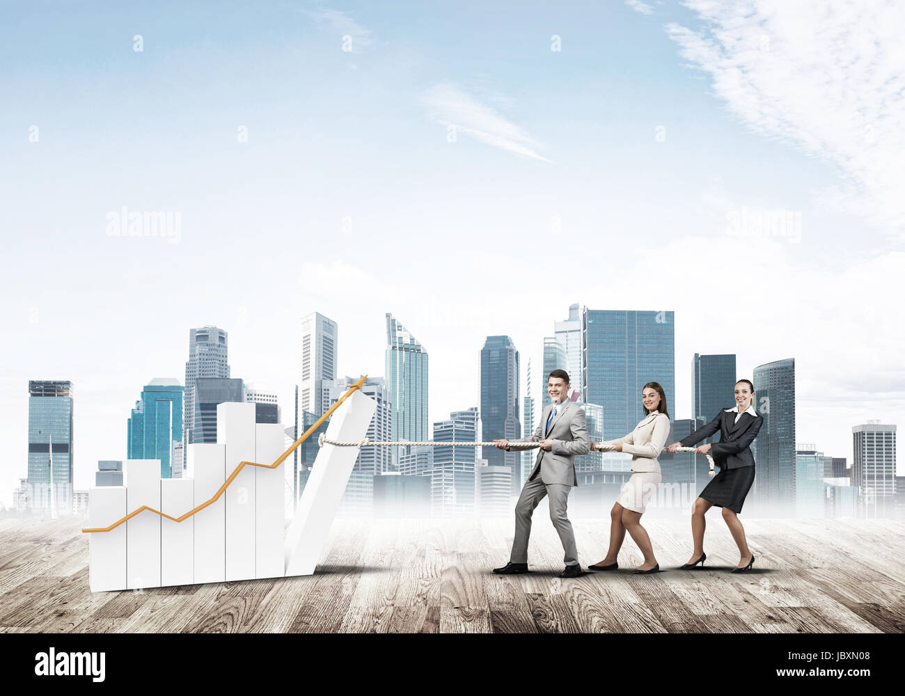 Young business people pulling up graph bar using rope Stock Photo - Alamy
