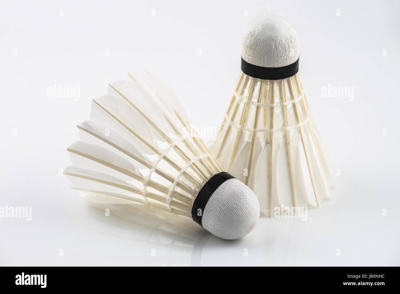 White shuttlecock isolated on white background Stock Photo - Alamy