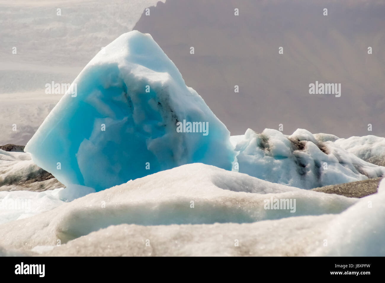 A blue-colored iceberg at Iceland's famous Joekulsarlon Bay Stock Photo ...