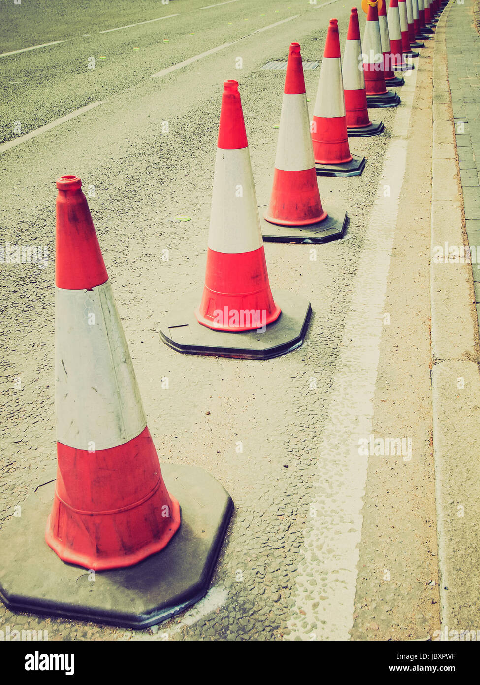 Vintage retro looking Traffic cone used in street road works Stock ...