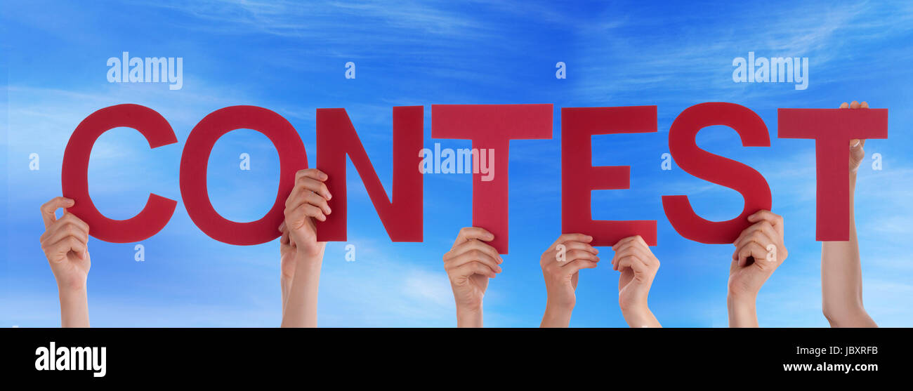 Many People Holding the Word Contest in the Sky Stock Photo - Alamy