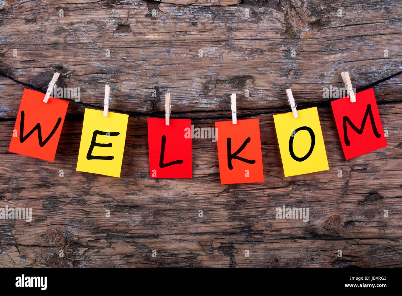 The Dutch Word Welkom, which means Welcome, on Notes Hanging on a Line ...