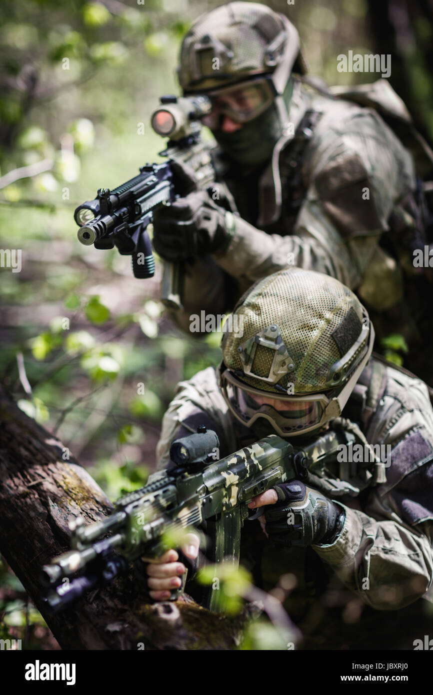 Group of soldiers special forces during raid in forest Stock Photo - Alamy