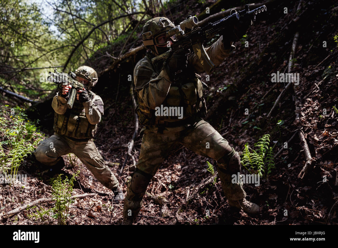 Portrait of officers on reconnaissance with machine guns Stock Photo ...