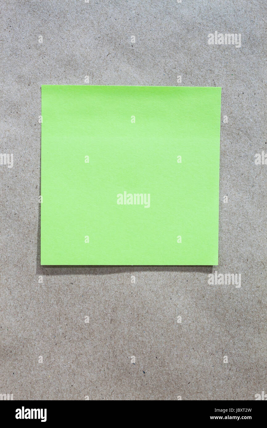 Brown gradient paper background with green note paper Stock Photo - Alamy