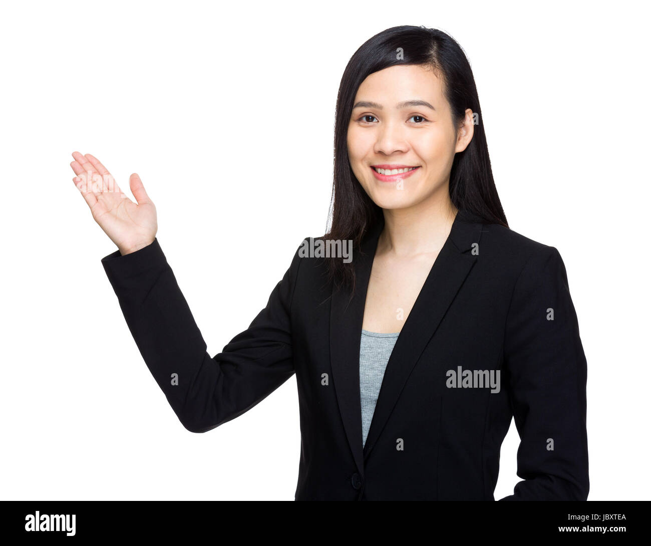 Businesswoman with hand show something Stock Photo - Alamy
