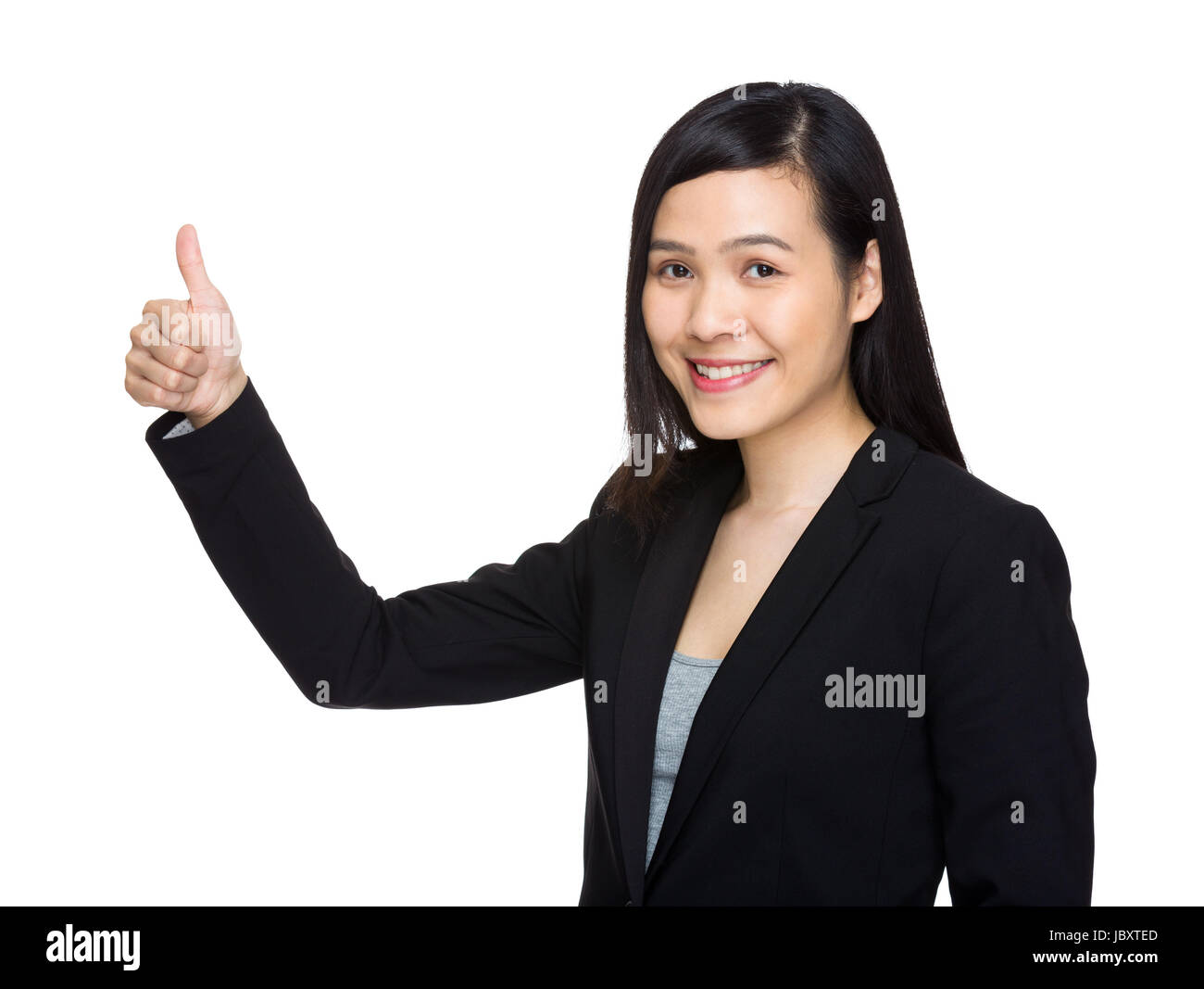 Business woman with thumb up Stock Photo - Alamy