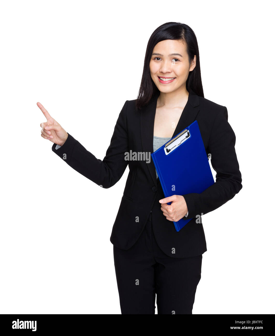 Business woman finger point out with clipboard Stock Photo - Alamy