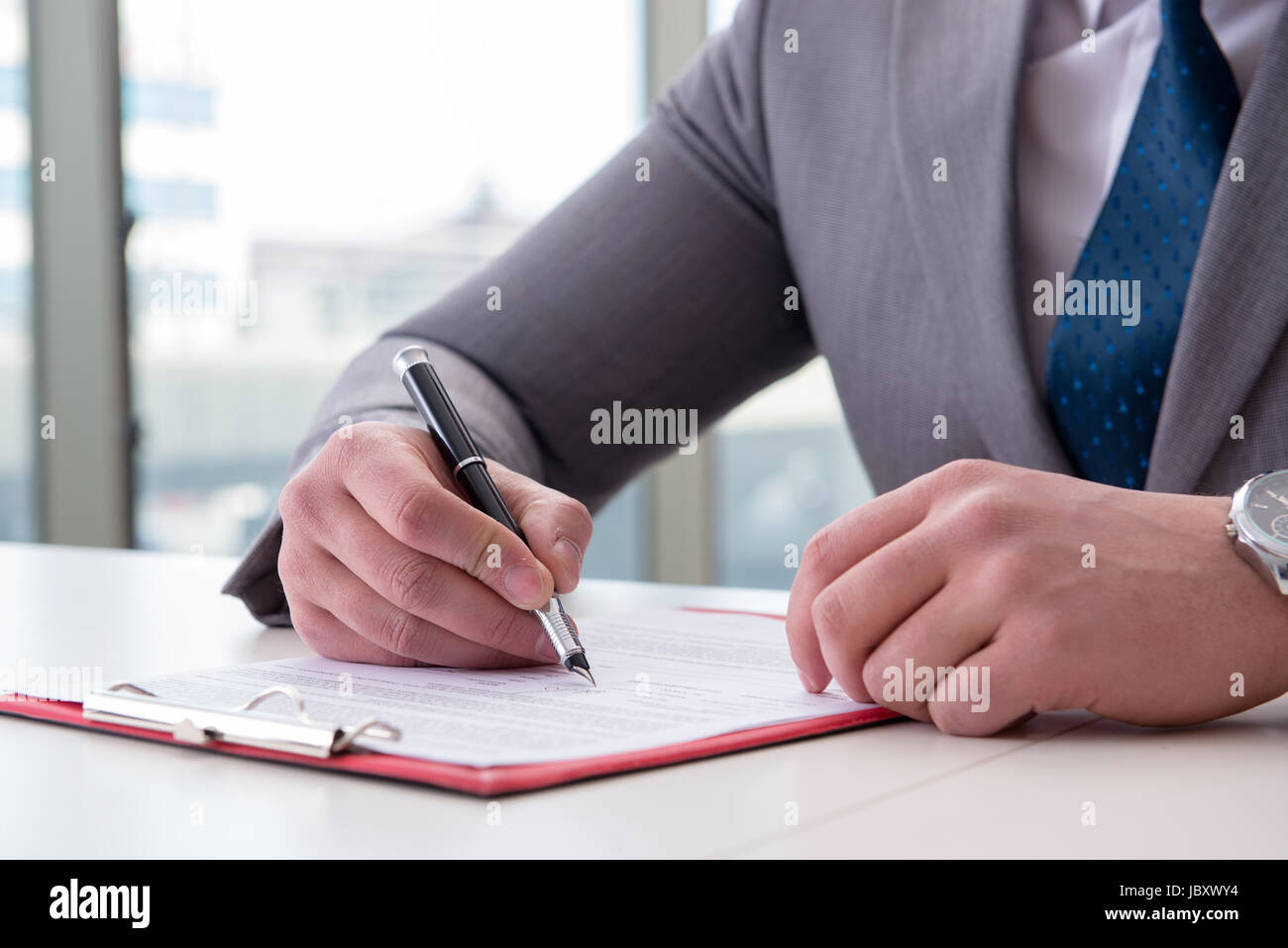 Businessman taking notes at the meeting Stock Photo - Alamy