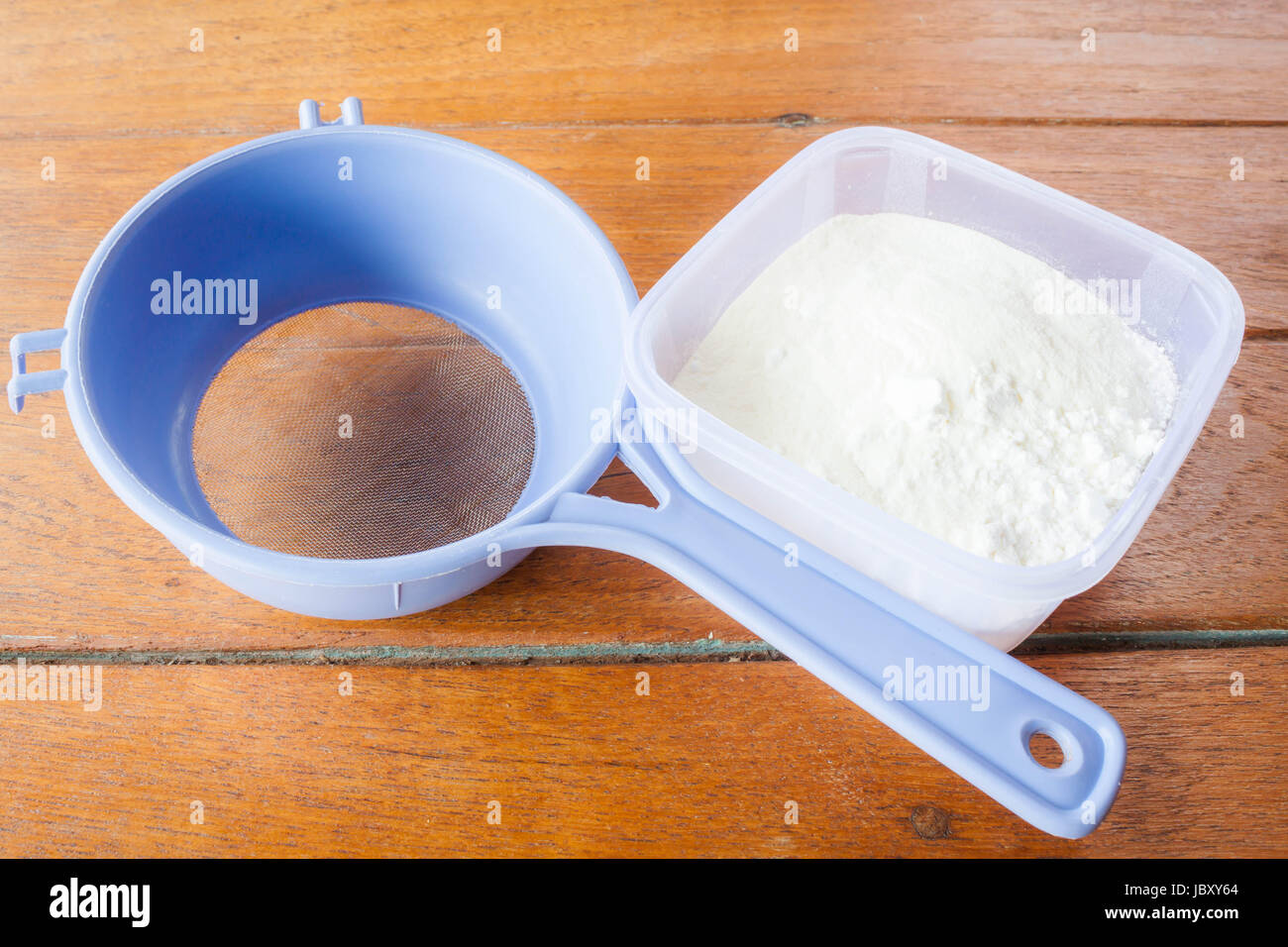 Bakery mix flour measured and sieve flour Stock Photo - Alamy