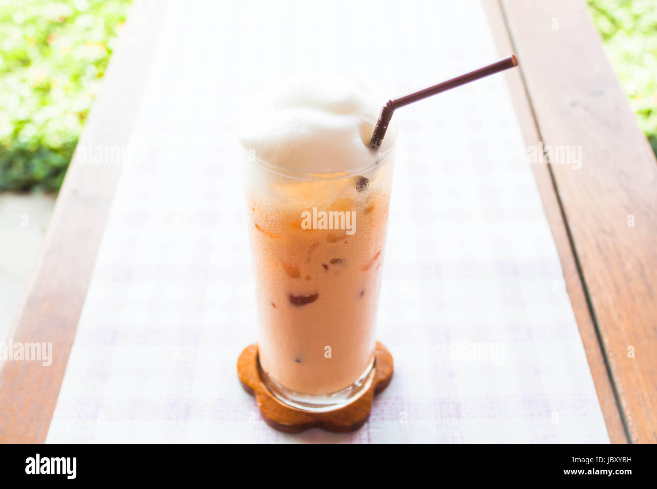 Fresh glass of cold thai milk tea Stock Photo - Alamy